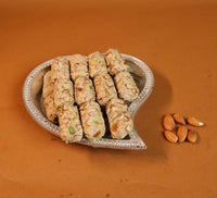 Buy Pothgaal Sweets Badam Honey Roll Online at Low Price – Distacart