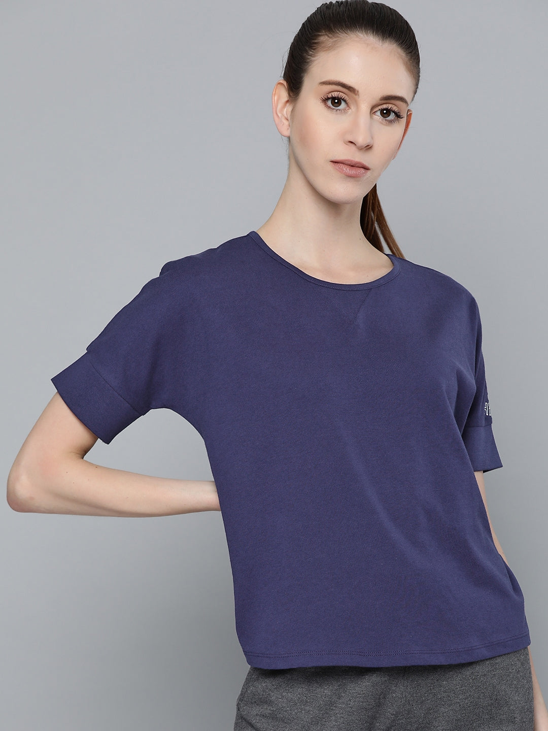 HRX by Hrithik Roshan Women Navy Blue Solid Round Neck T-shirt - Distacart